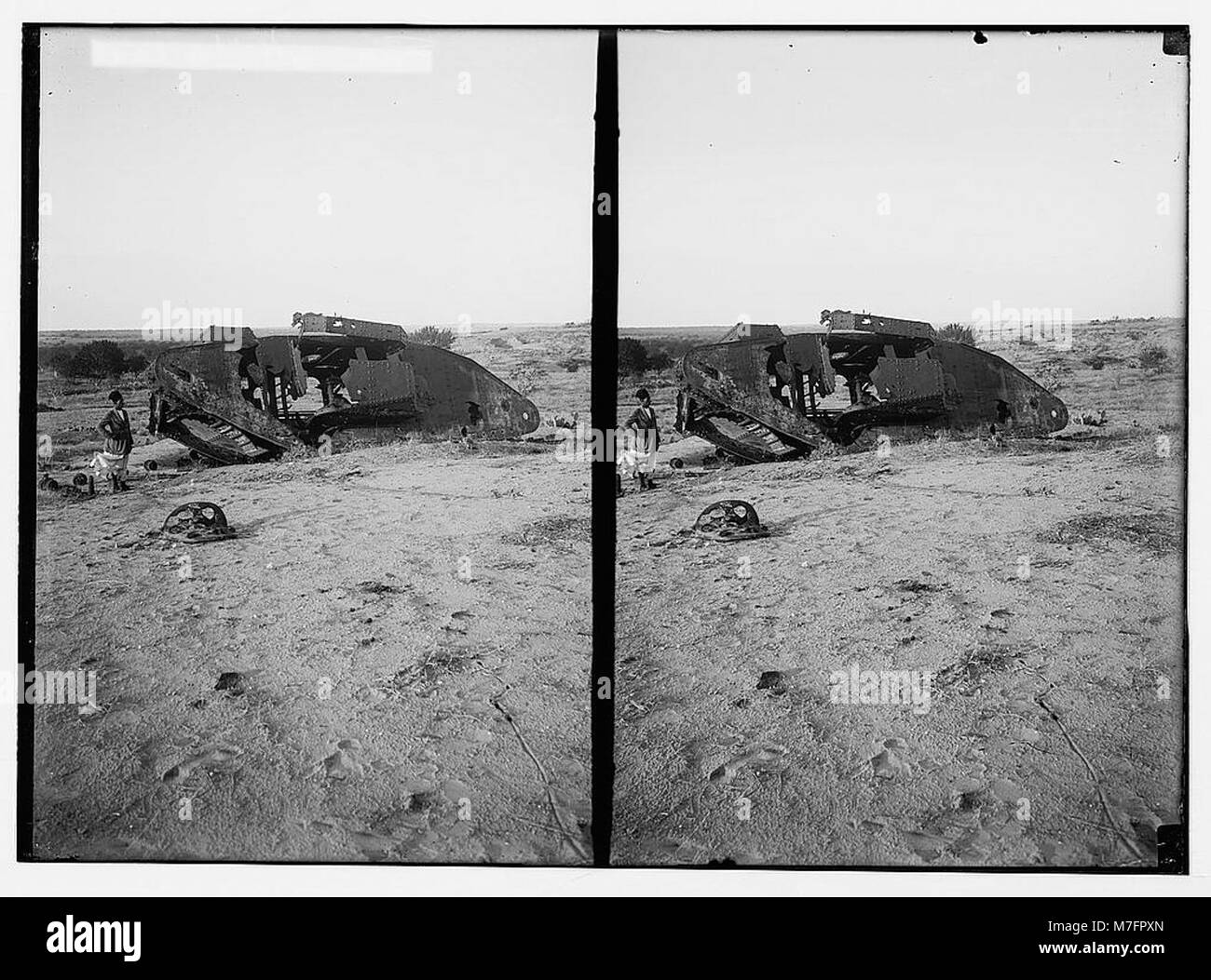 The image depicts a disabled tank in Gaza, highlighting the aftermath ...