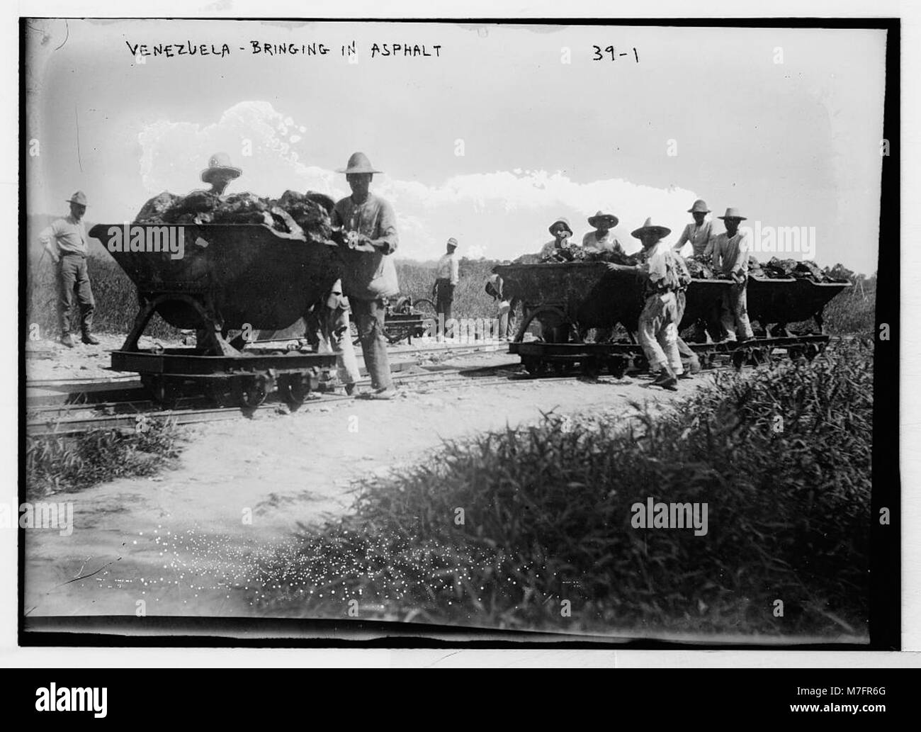 A scene showing the process of bringing in asphalt in Venezuela ...