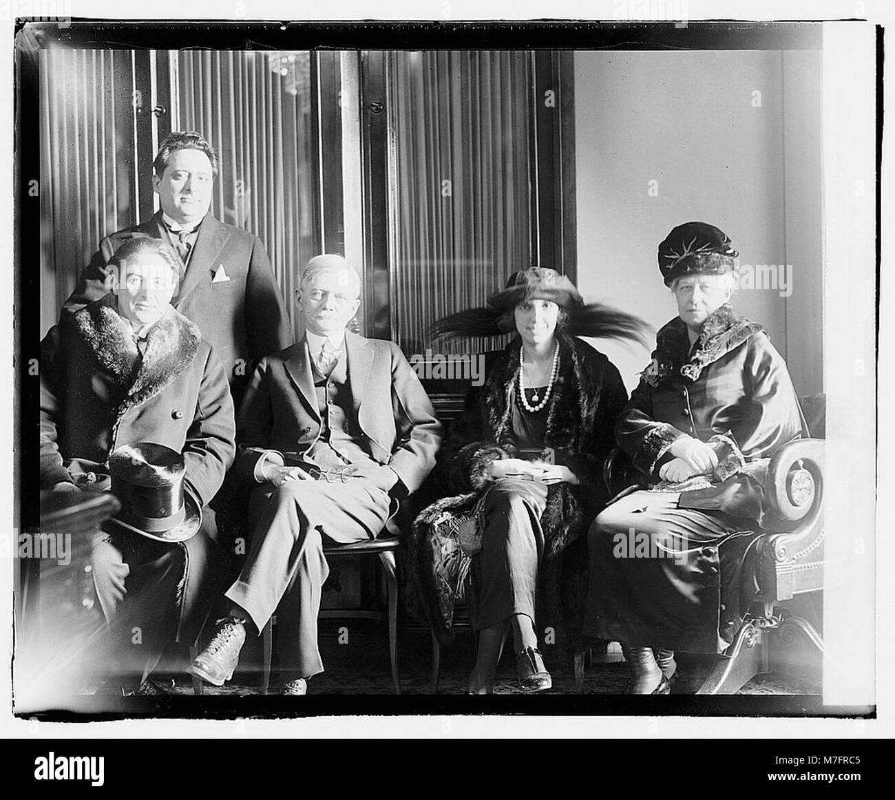 A photograph of Vice President Thomas R. Marshall with a group of ...