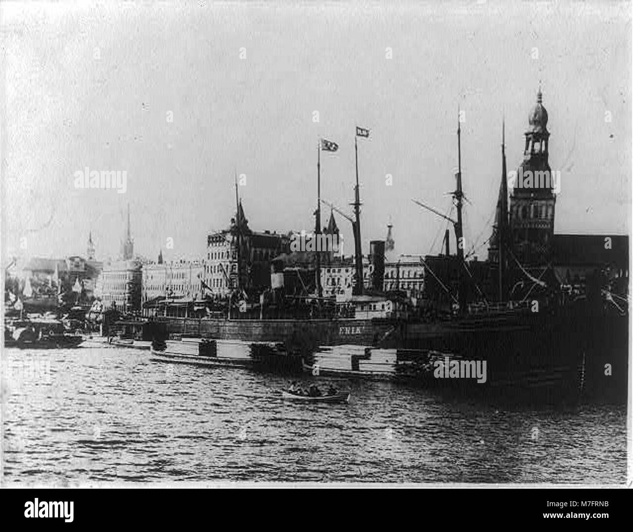 A photograph of the Riga waterfront in Latvia, featuring the freighter ...