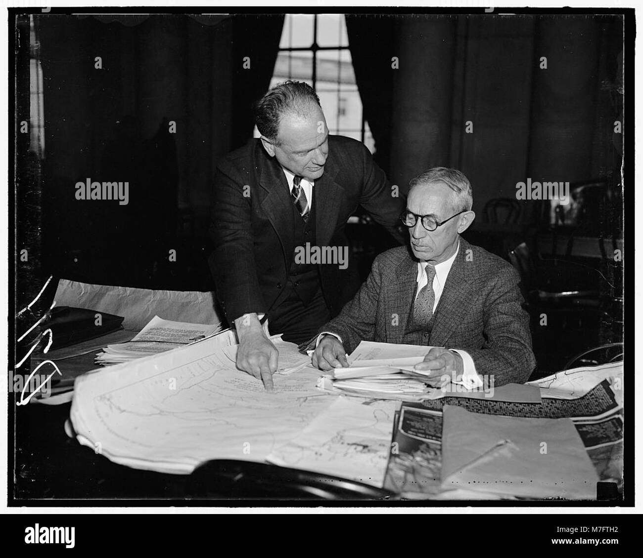A portrait of Walter B. Wooden and Hugh White, capturing two figures ...