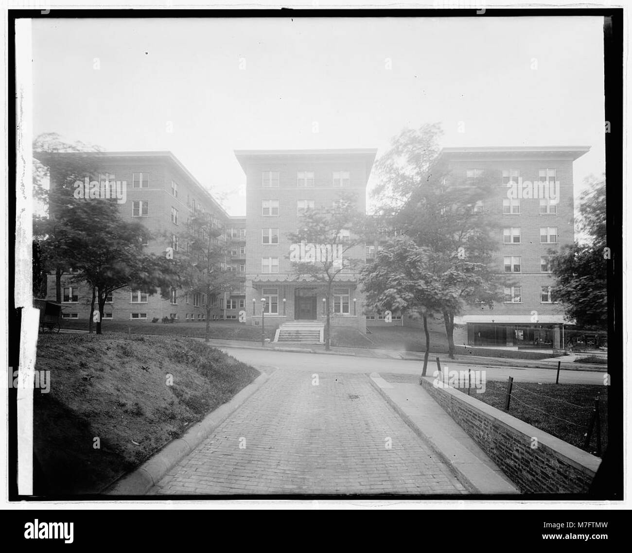 The title refers to Wardman Courts in Washington, D.C., a residential ...