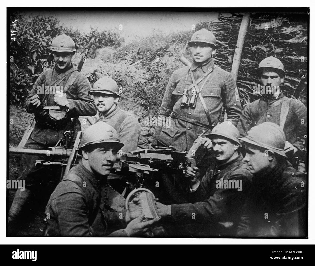 In this war scene, soldiers are seen preparing ammunition ...