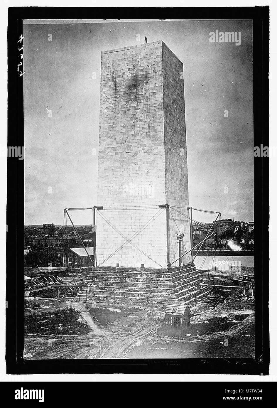 This image captures the Washington Monument under construction in Washington, D.C., providing a ...