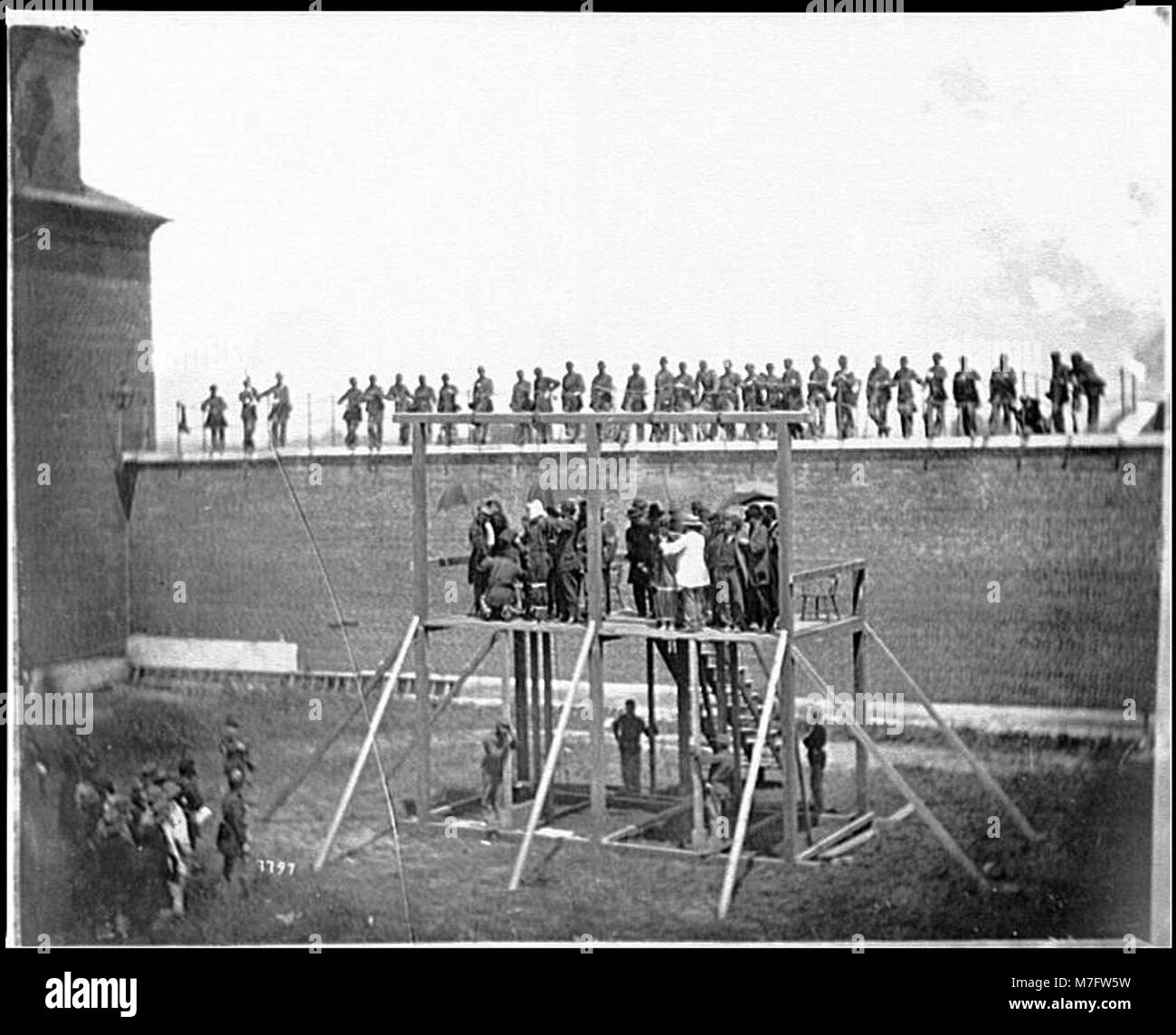 This photograph shows the moment of adjusting ropes for the execution ...