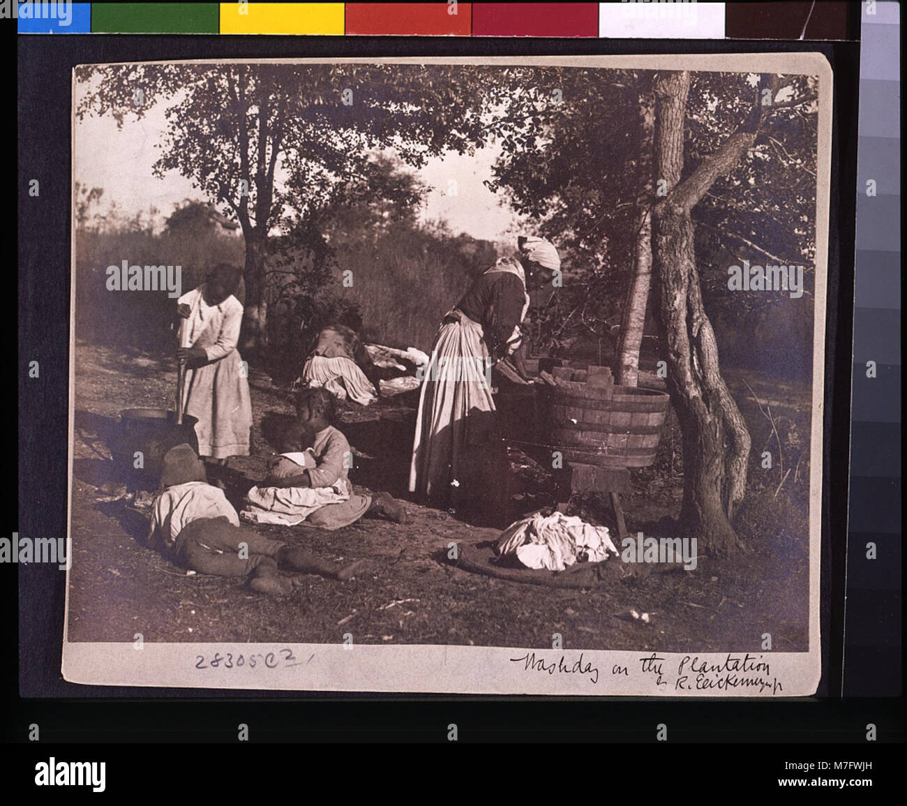 A photograph by R. Eickemeyer depicting wash day on a plantation ...