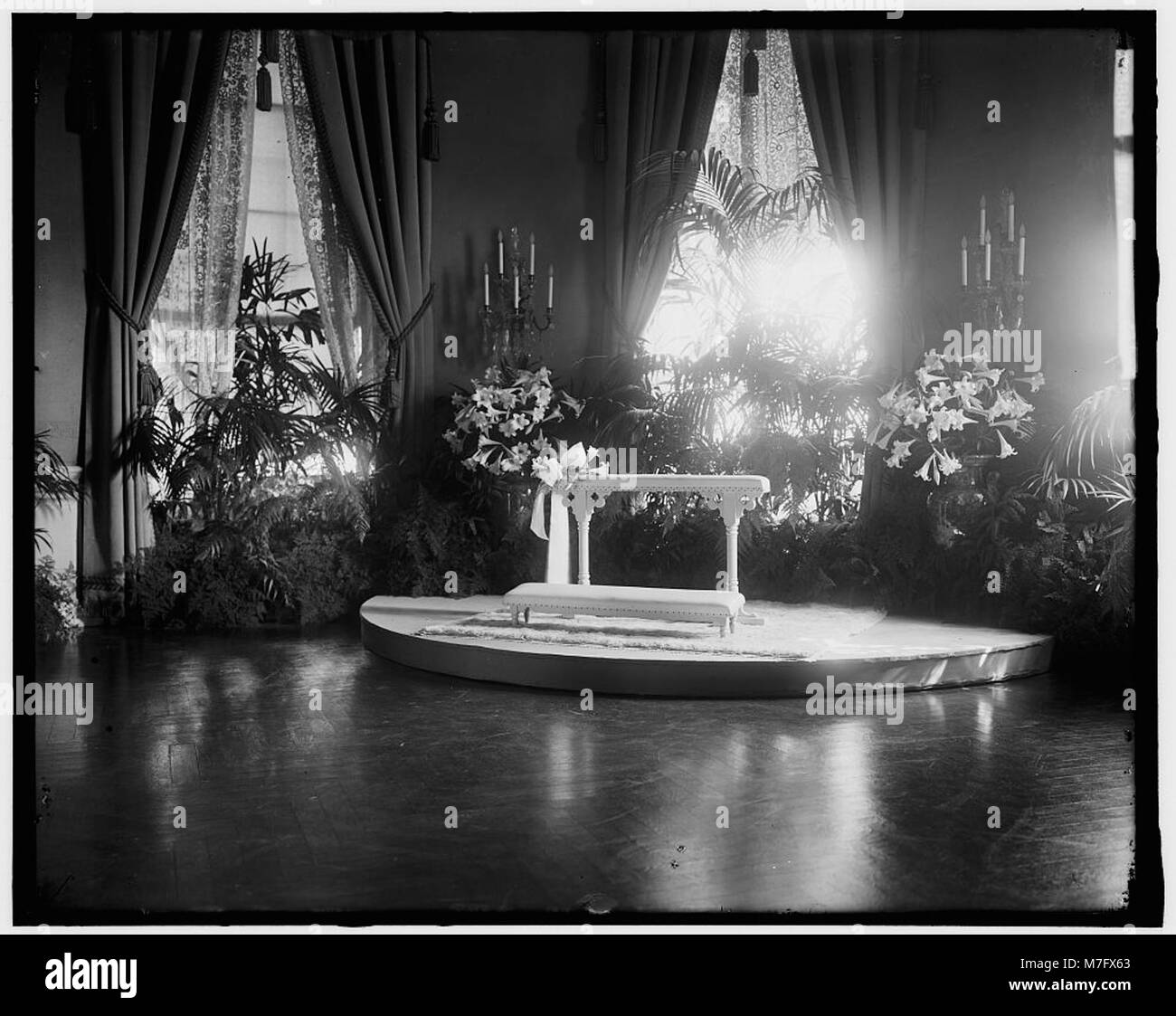 This photograph features the East Room of the White House, set up for ...