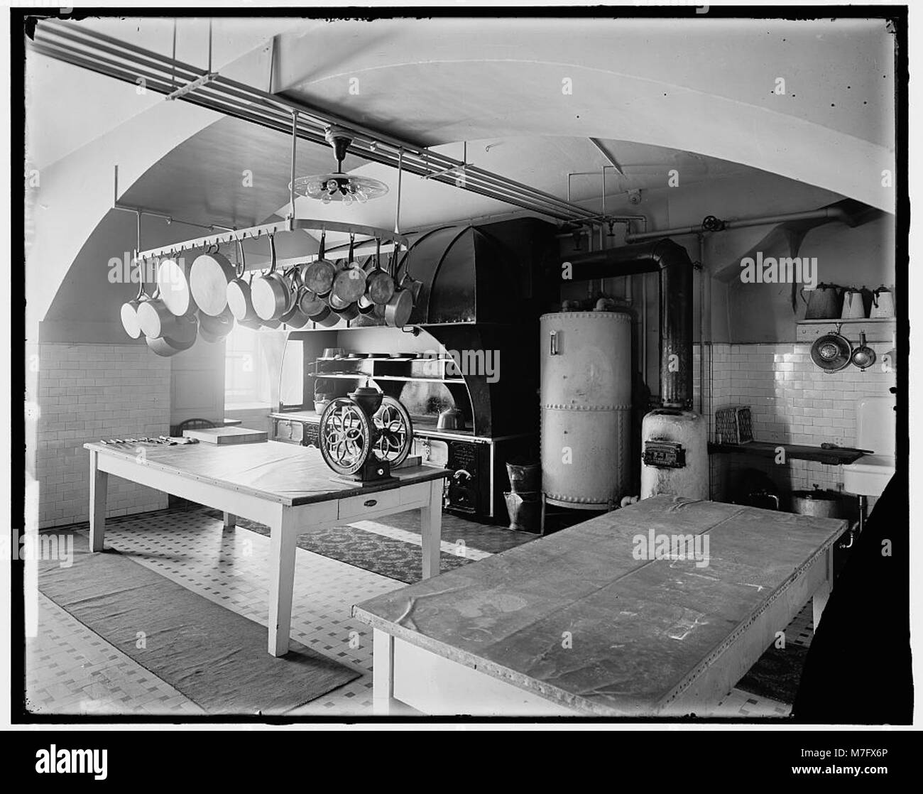 The image depicts the kitchen of the White House, showcasing the ...