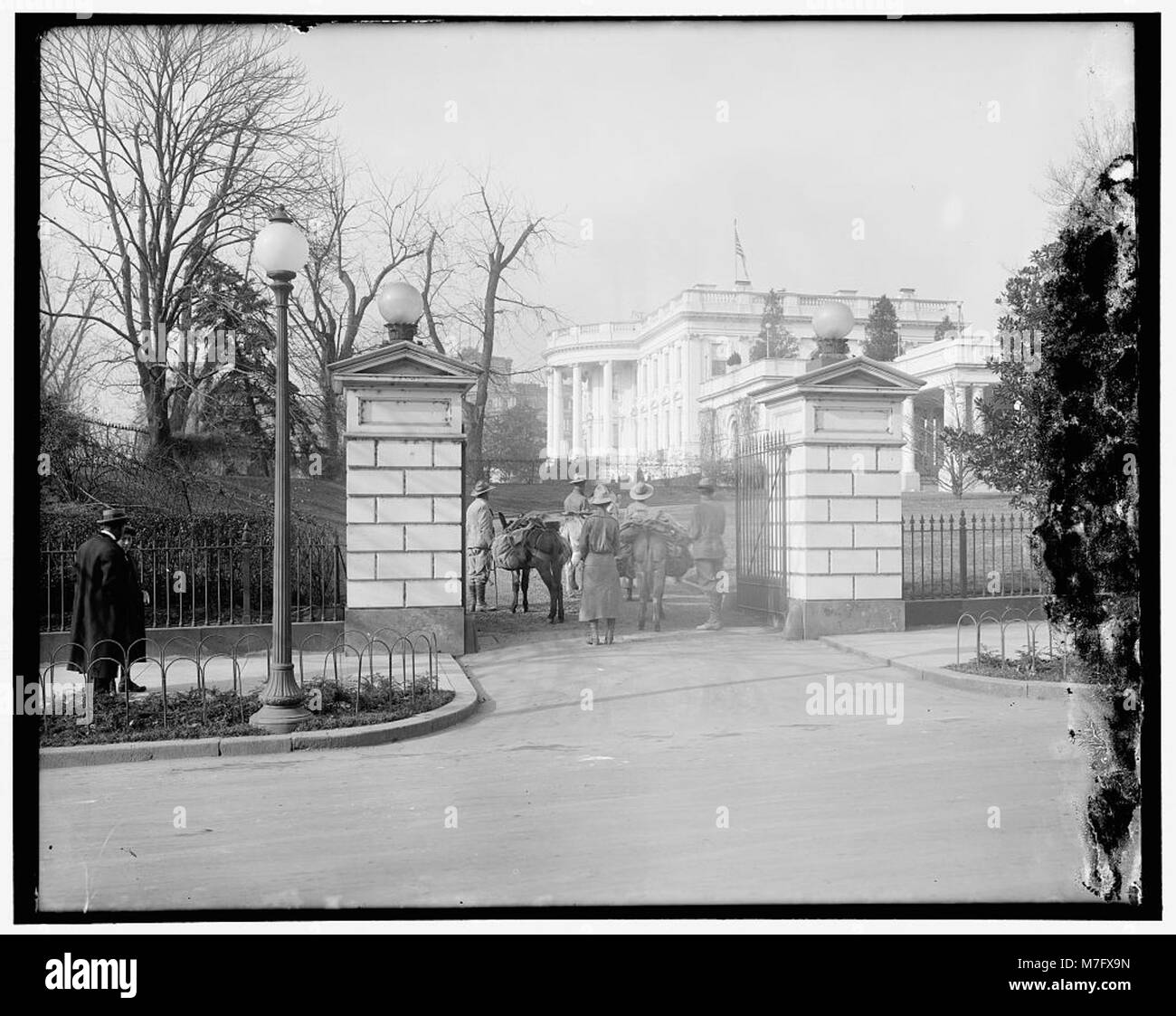 The White House gate, a symbol of American government and power, is ...