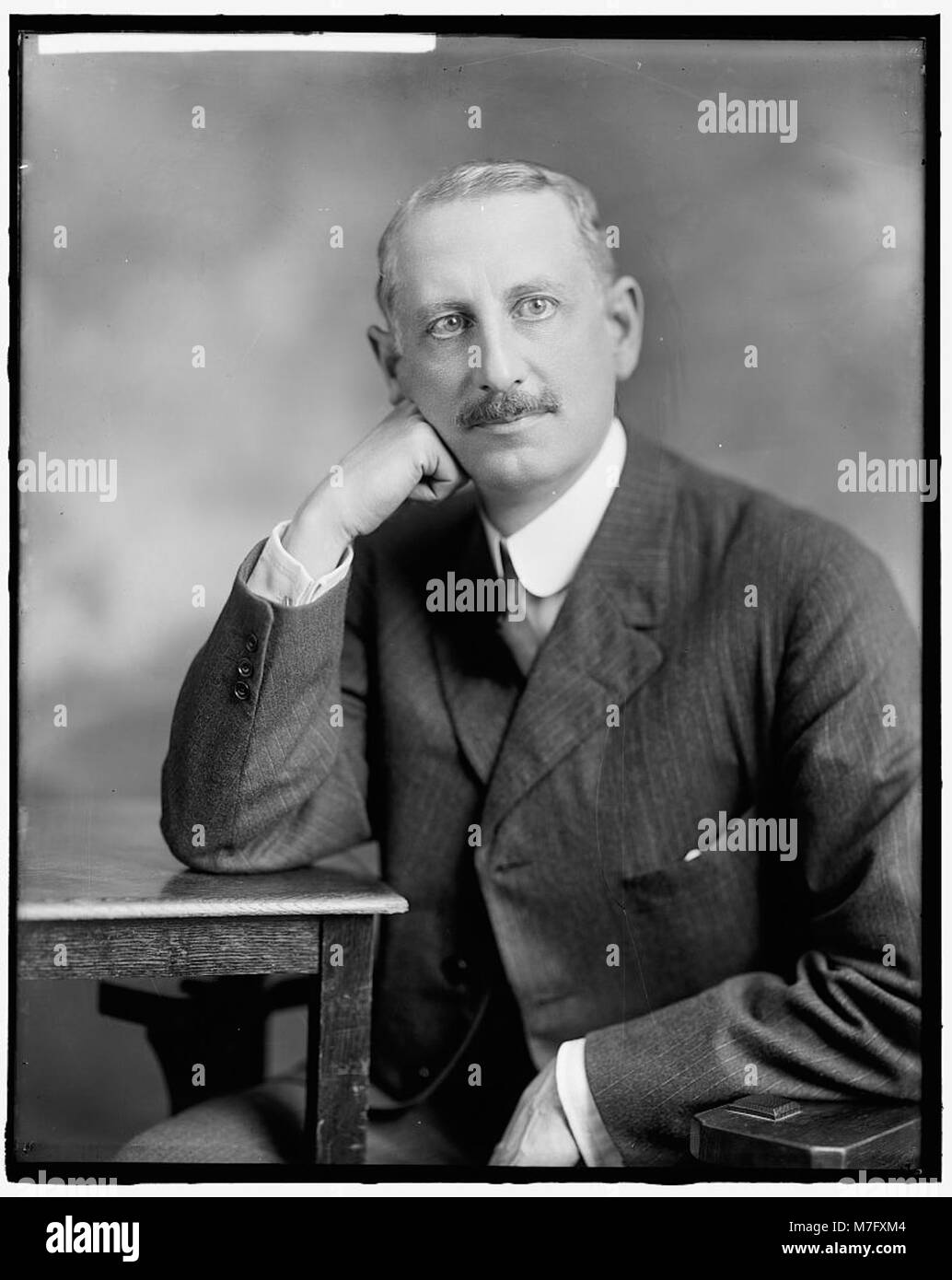 A formal portrait of J.E. Willard, an ambassador, likely captured for ...