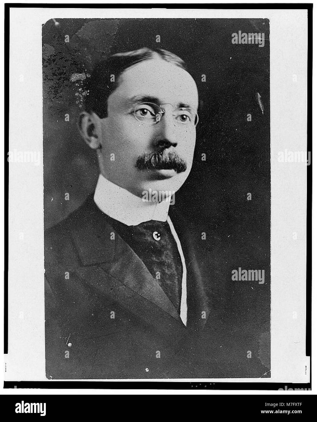 This bust portrait of William N. Buckley captures the subject in a ...