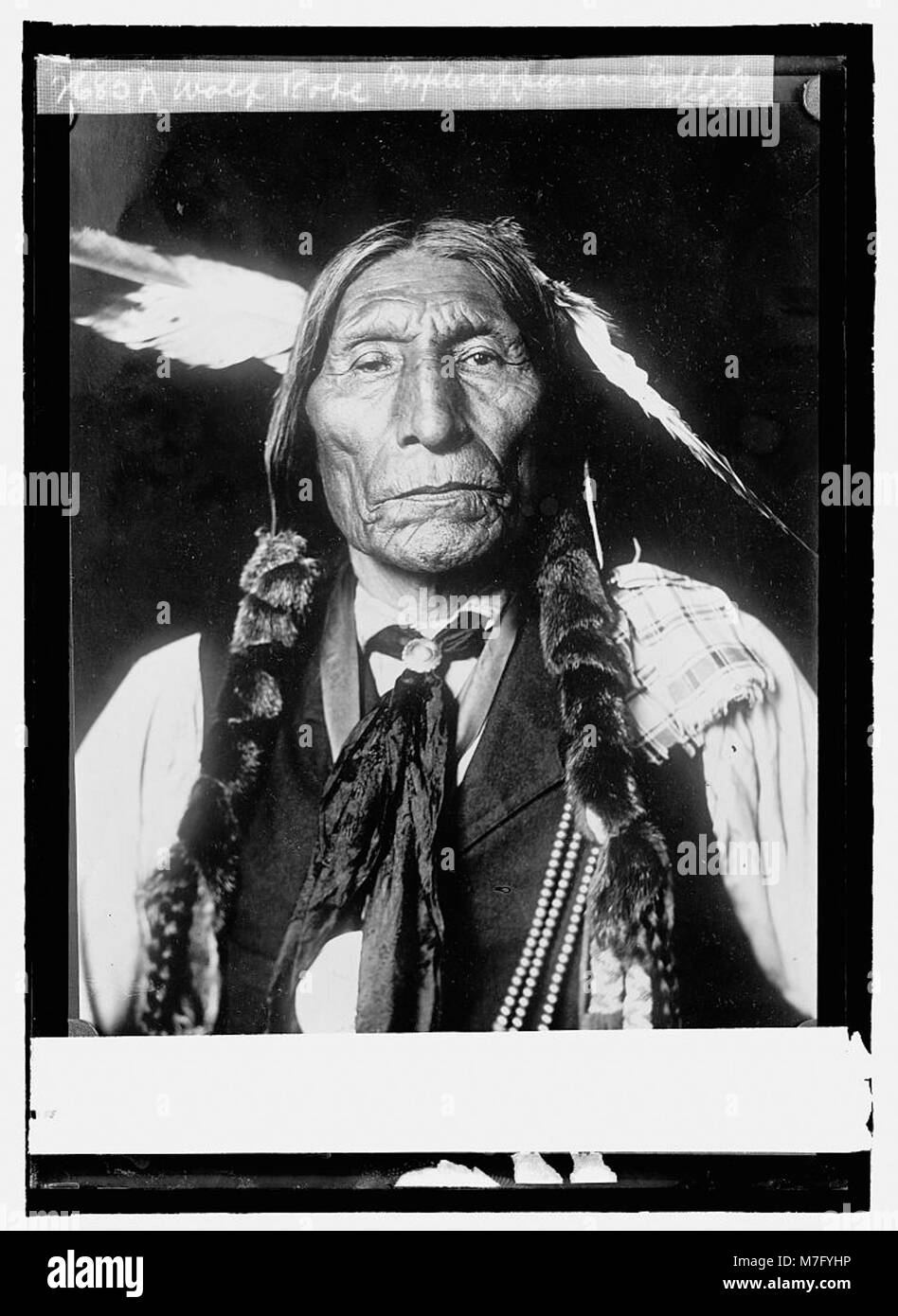 A profile of Wolf Robe, a prominent Native American leader, appears on ...