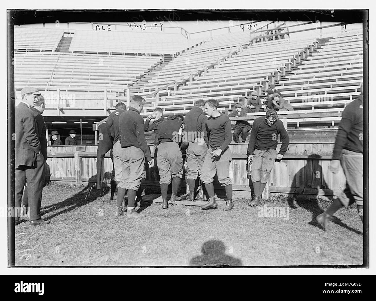 The Yale varsity football team, shown before or after practice ...