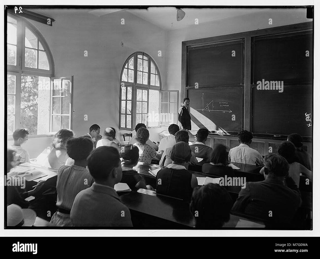 A historical photograph depicting a mathematics class at the Hebrew ...