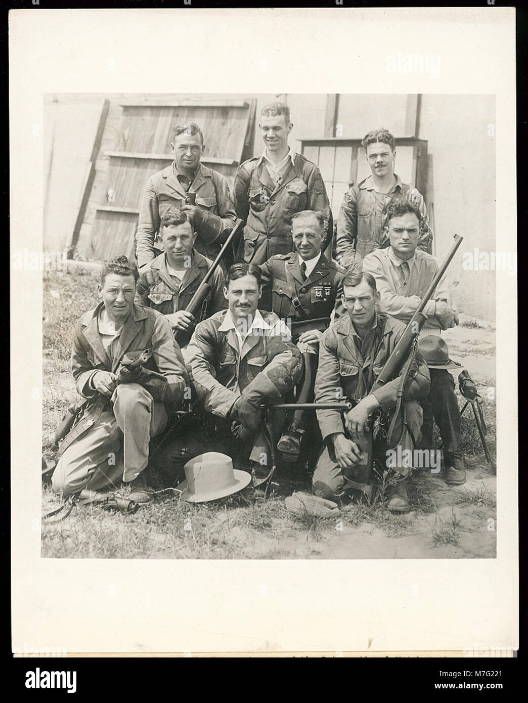 This photograph features the U.S. Free Rifle Team, victorious in ...