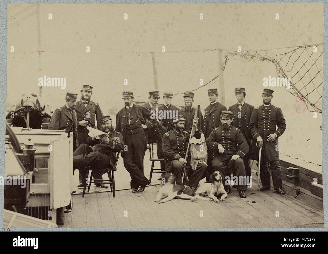 This image shows U.S. Navy officers on the deck of the gunboat Miami, a ...