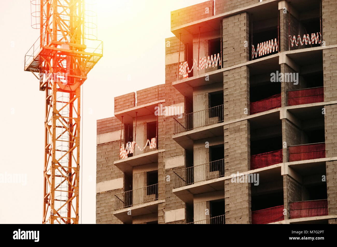 Construction site of the new building in evening Stock Photo - Alamy