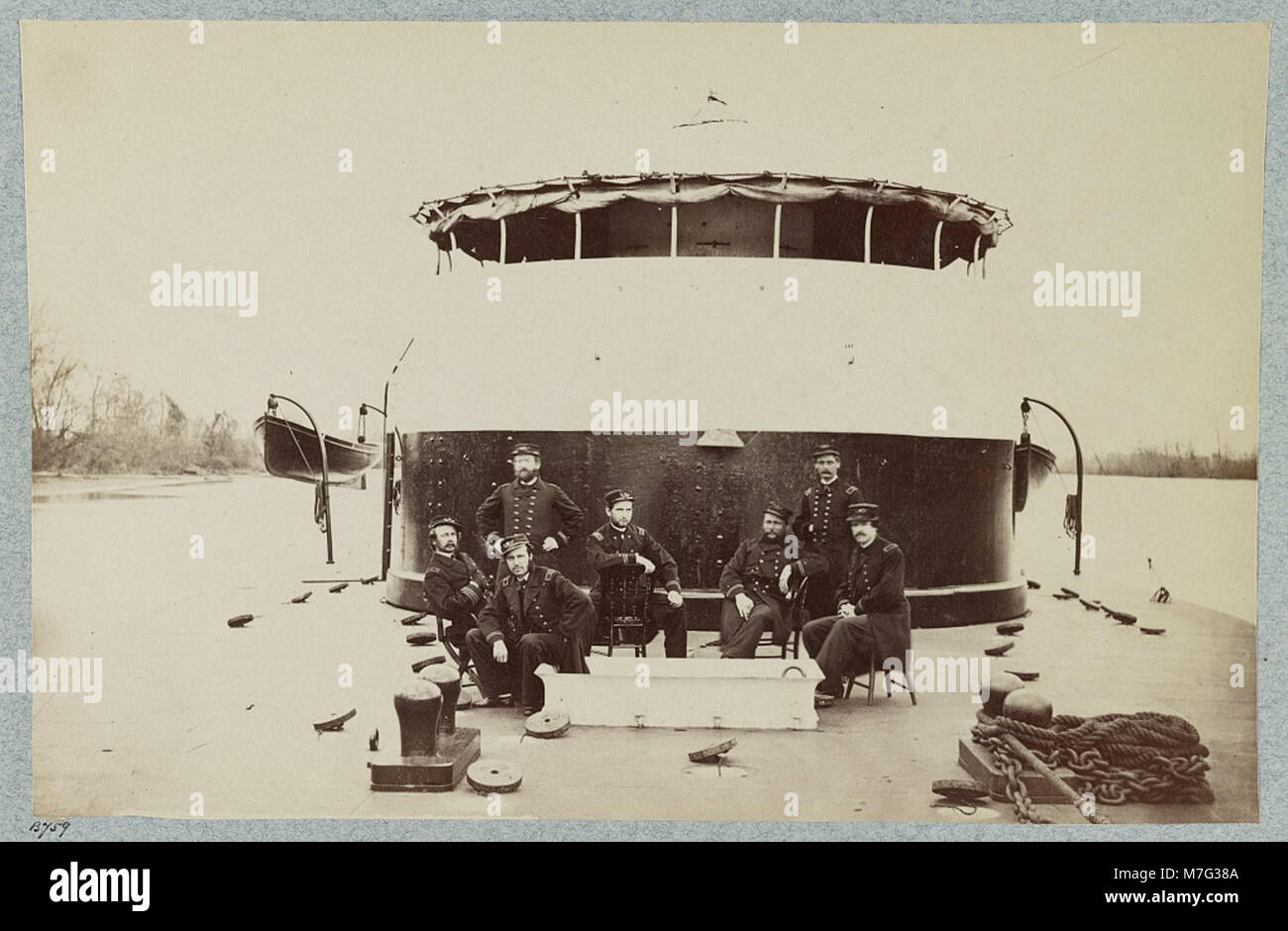 Officers are pictured aboard the USS Saugus, a Civil War-era ironclad ...