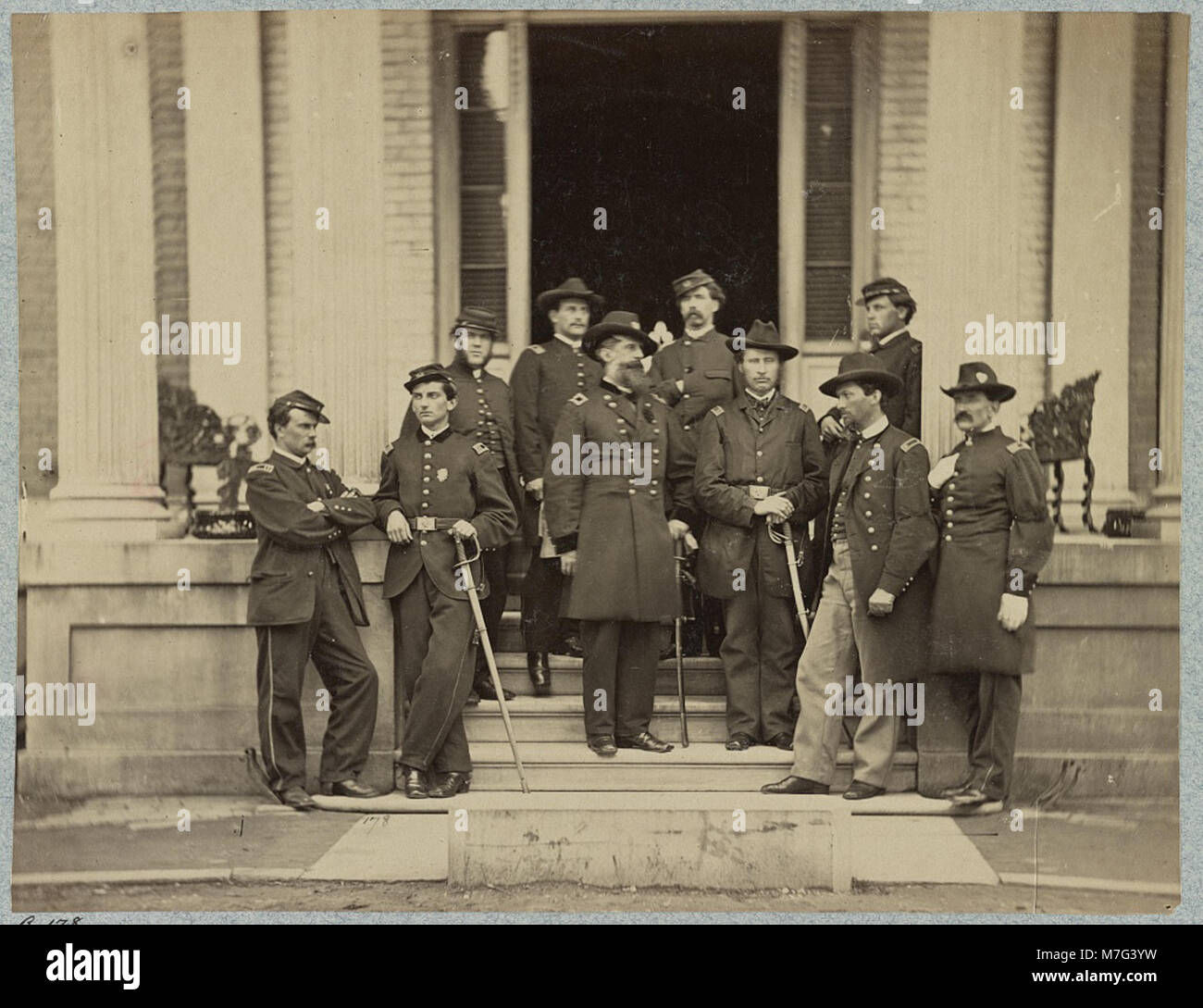This photograph depicts Brevet Major General Charles Devens and his staff in Richmond, Virginia ...