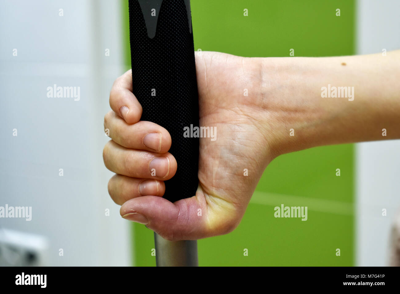 Pregnant woman's pressured hand during labor in the hospital. The birth ...