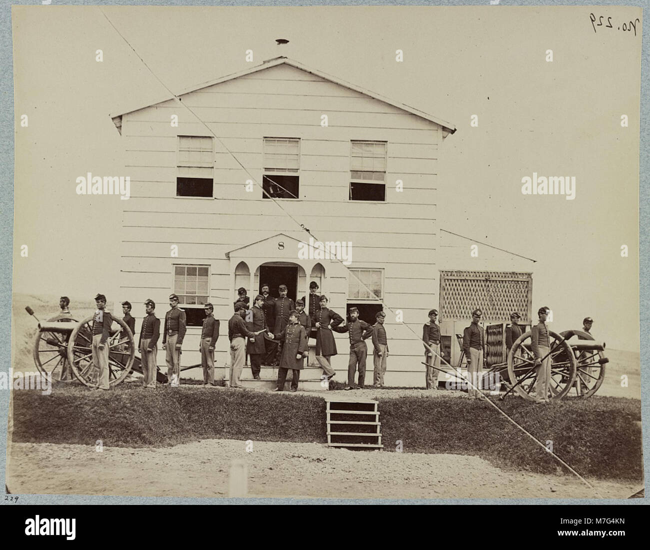 The photograph shows Brevet Brigadier General J.A. Hall and his staff ...