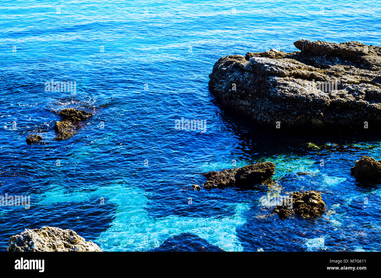 Amazing sea with blue summer wave and rocks, relaxing view of rocks and ...