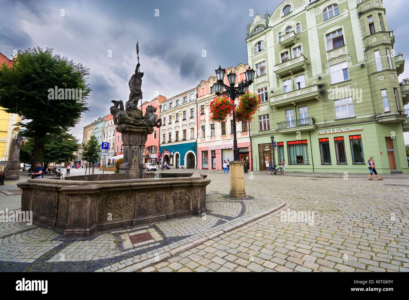 SWIDNICA, POLAND - JULY 05, 2017: Fountain and burgher tenements at ...