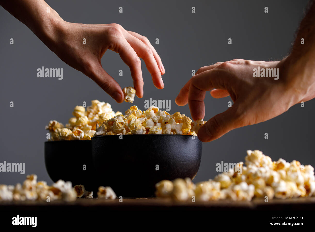 Hand popcorn cutout hi-res stock photography and images - Alamy