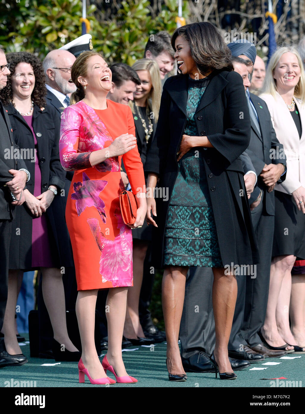 First Lady Michelle Obama and Mrs. Sophie GrÈgoire Trudeau share a ...