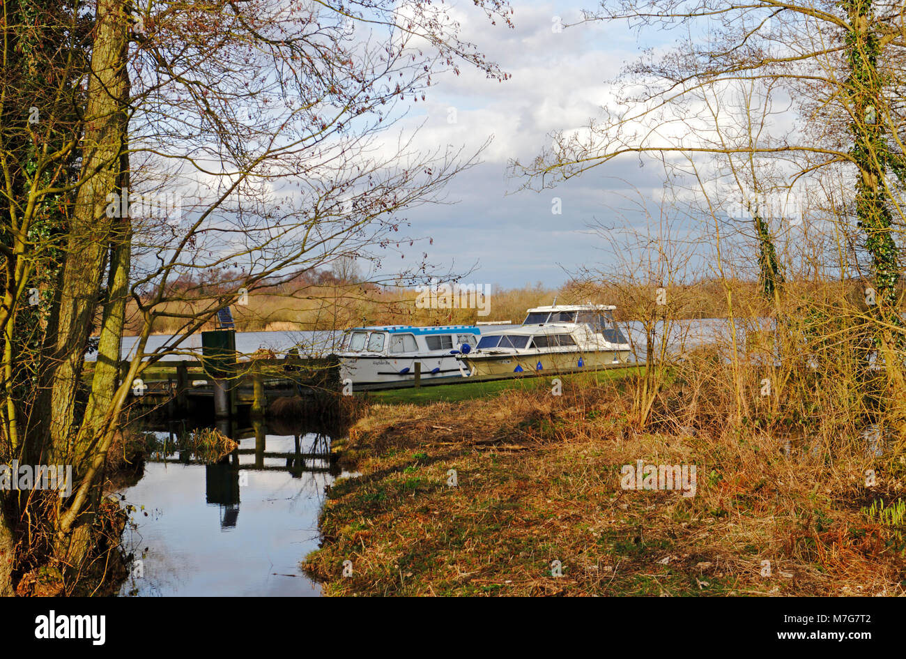 A view of boats tied-up in private moorings at Malthouse Broad on the ...