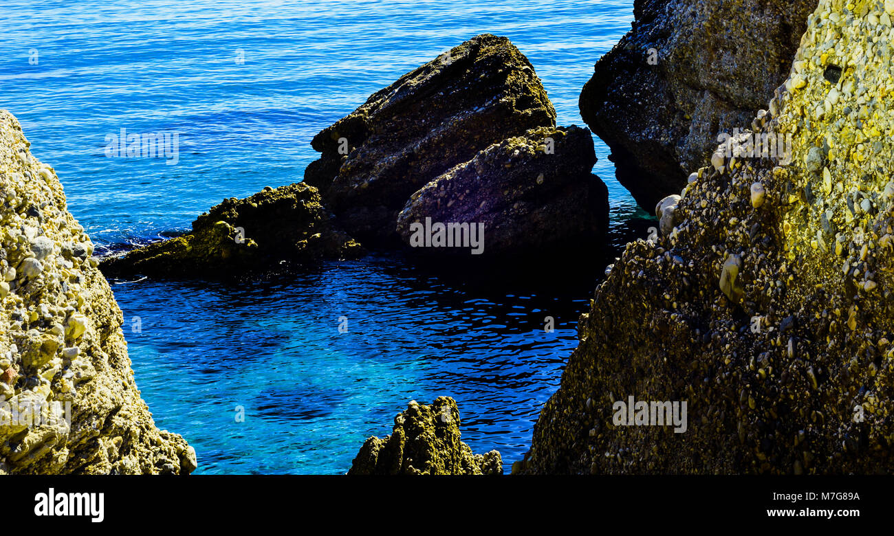 Amazing sea with blue summer wave and rocks, relaxing view of rocks and ...