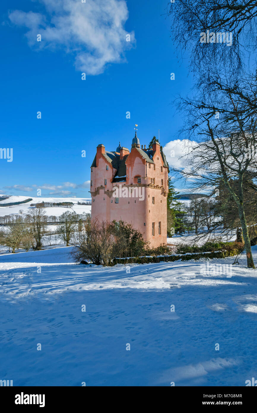 CRAIGIEVAR CASTLE ABERDEENSHIRE SCOTLAND PINK TOWER BLUE SKY AND WINTER ...