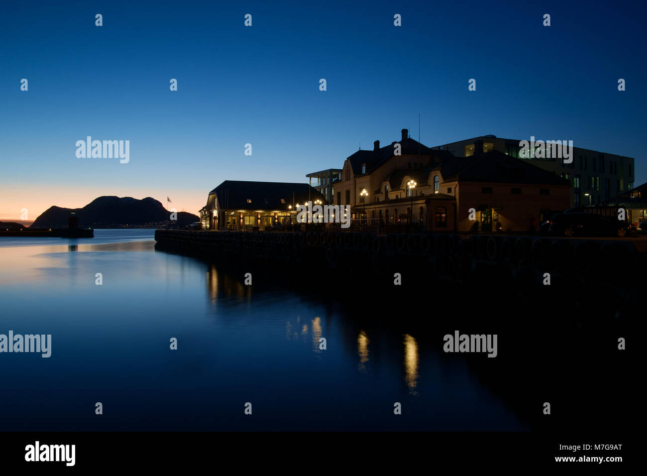 Alesund harbour at dusk, Norway Stock Photo - Alamy