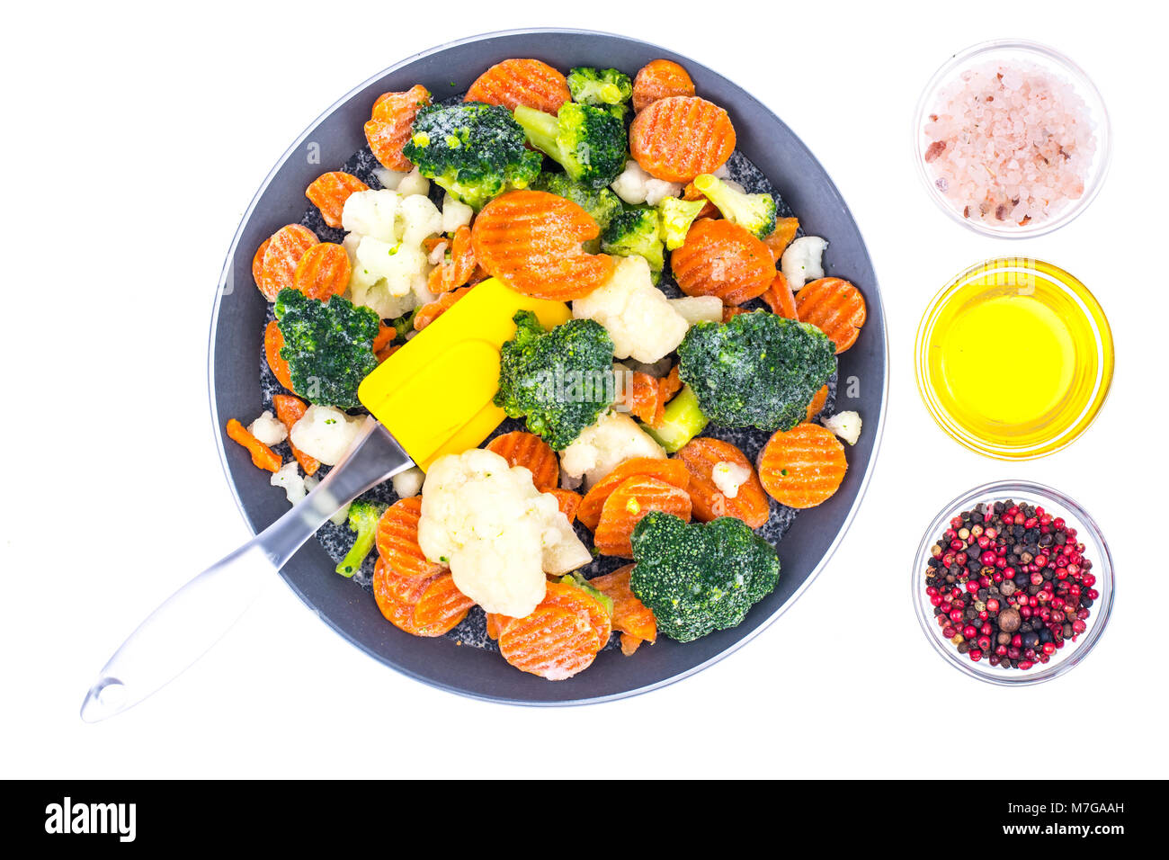Frying pan with frozen vegetables Stock Photo - Alamy