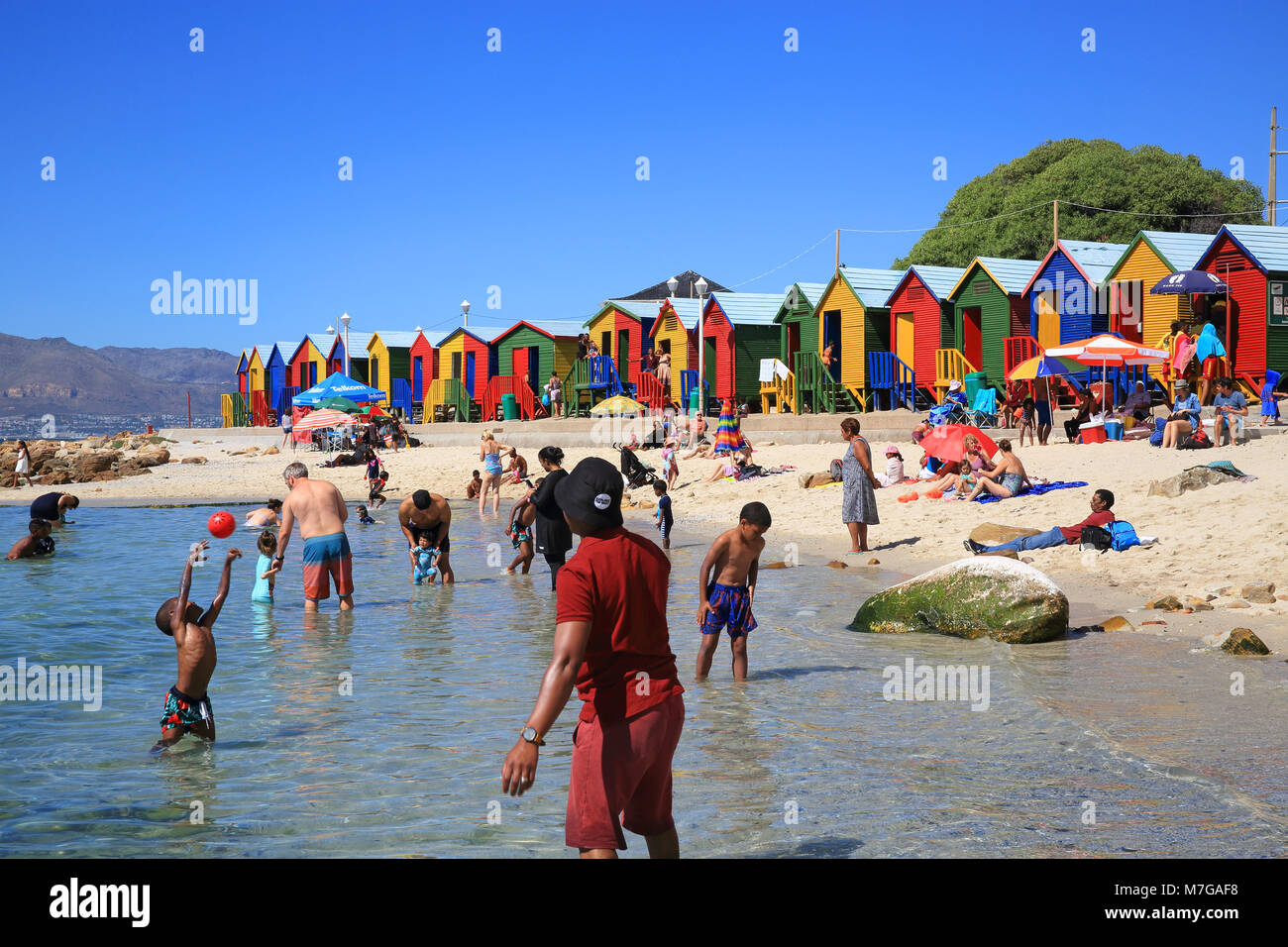 The small sheltered St James Beach, near Kalk Bay on False Bay, on the ...