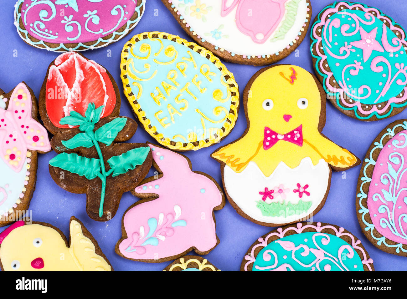 Colorful вelicious Easter gingerbread cookies background. Eggs, rabbit ...
