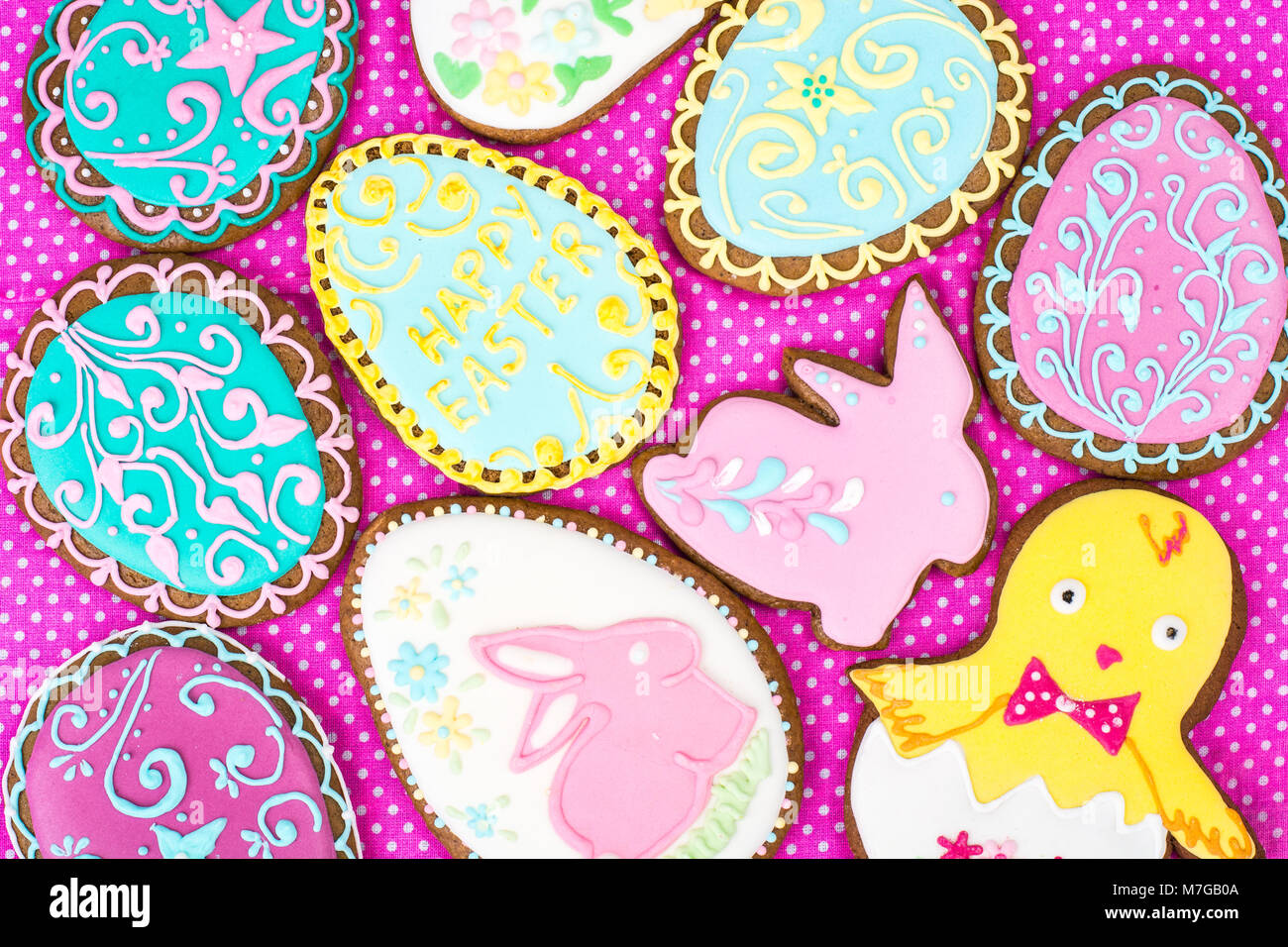 Colorful вelicious Easter gingerbread cookies background. Eggs, rabbit ...
