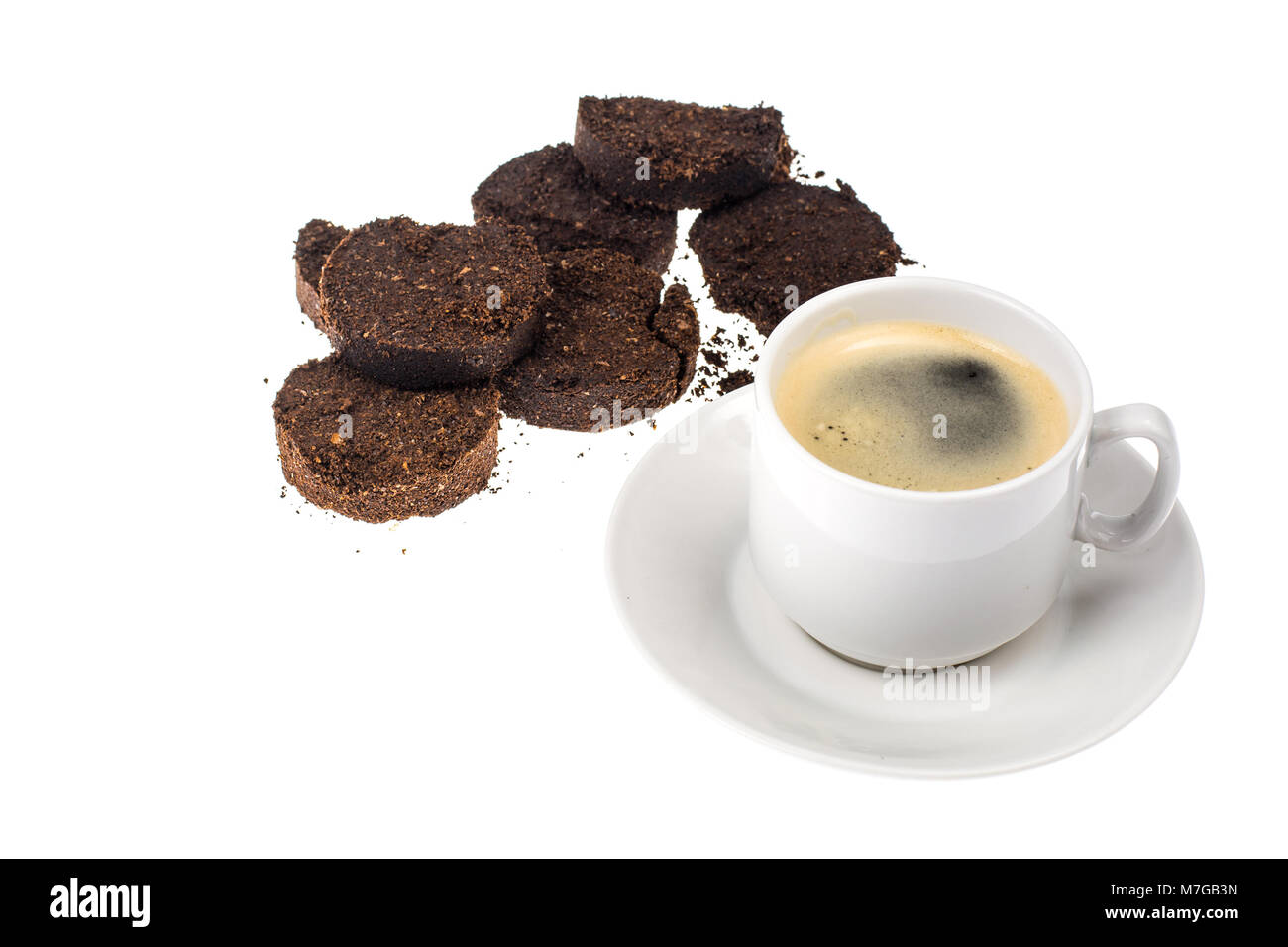 White cup with espresso, waste from the coffee machine Stock Photo - Alamy