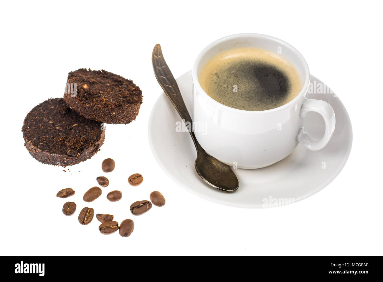 White cup with espresso, waste from the coffee machine Stock Photo - Alamy