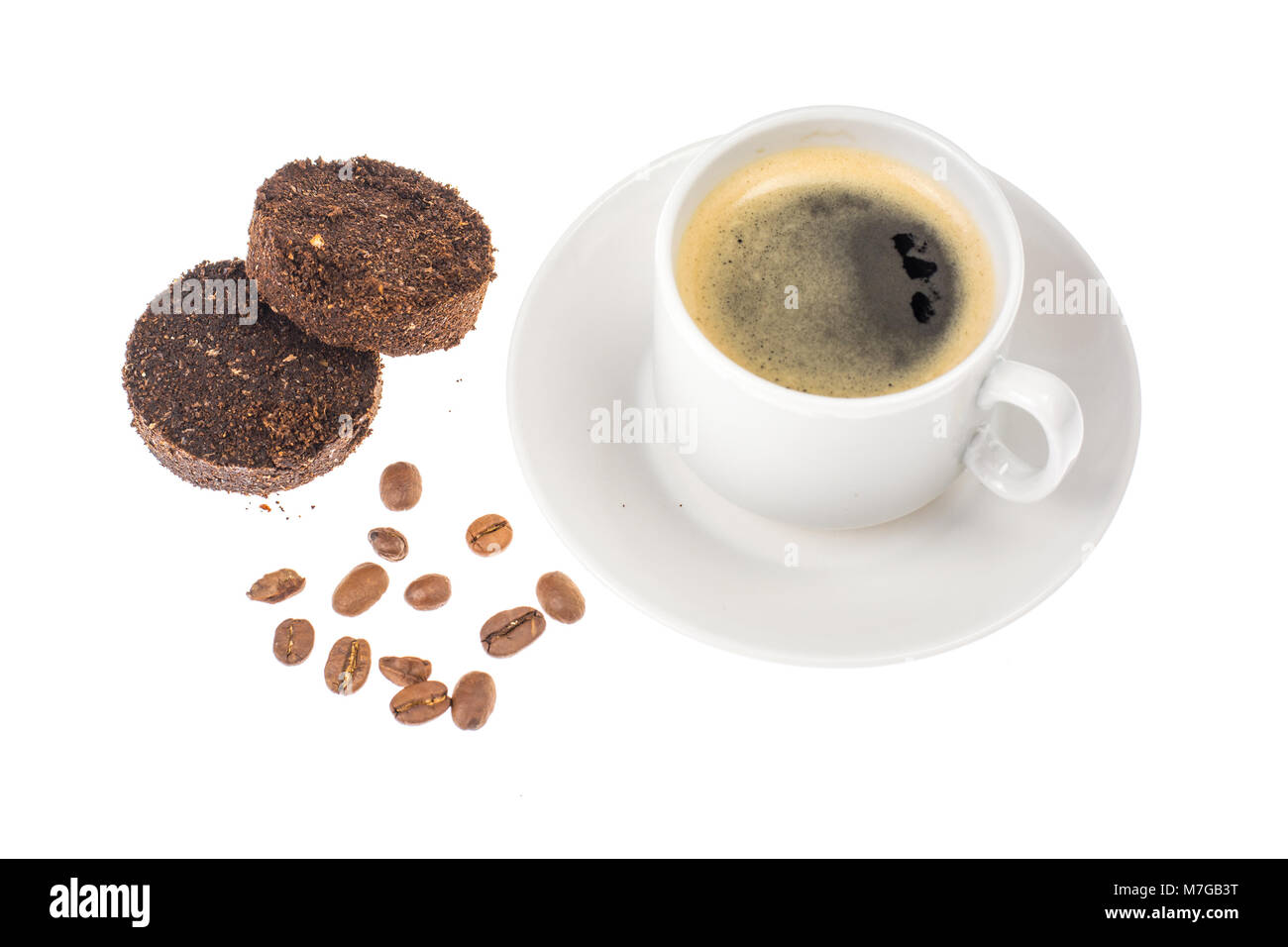 White cup with espresso, waste from the coffee machine Stock Photo - Alamy