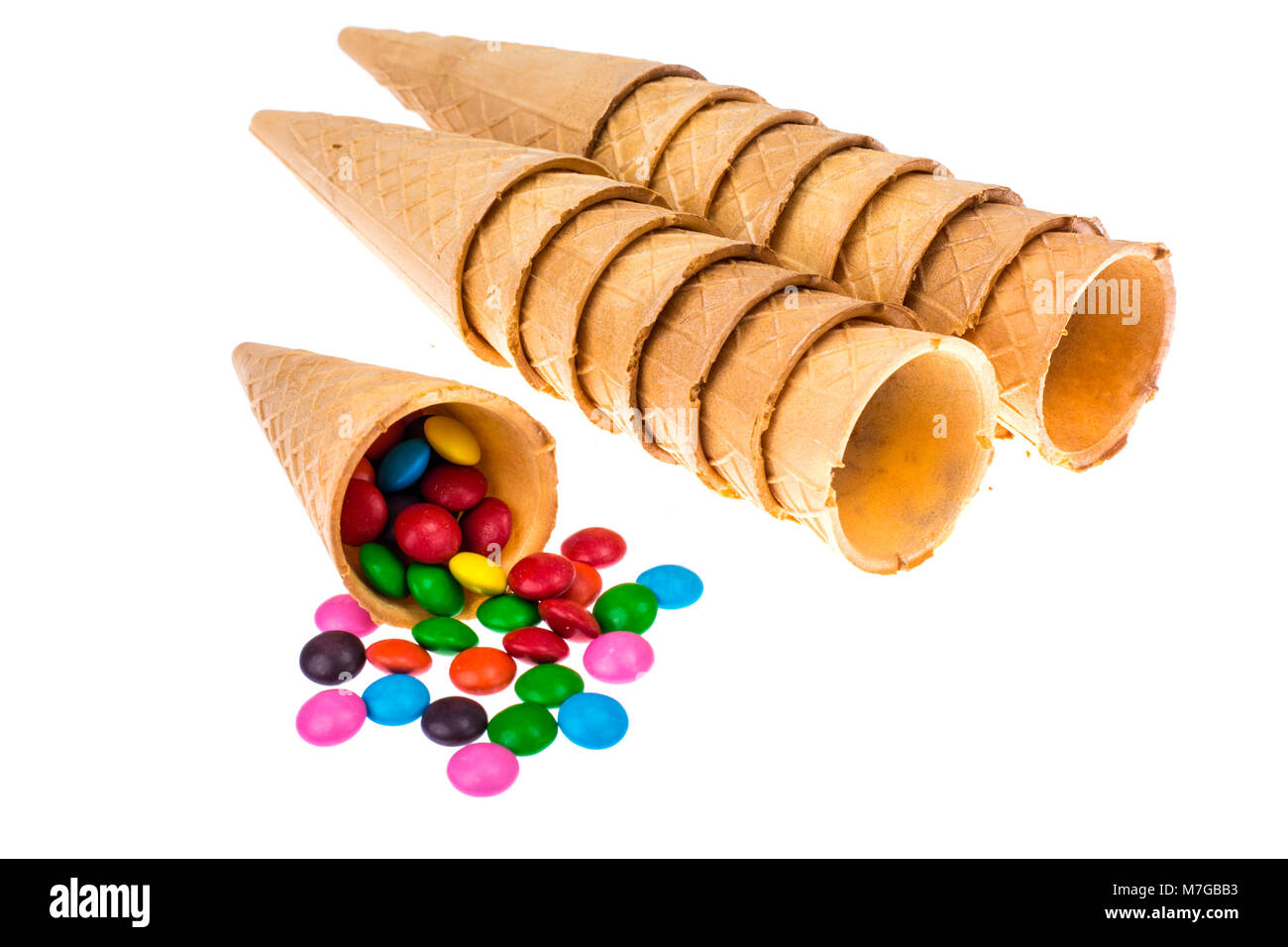 Crispy waffle cones with colorful candies Stock Photo - Alamy
