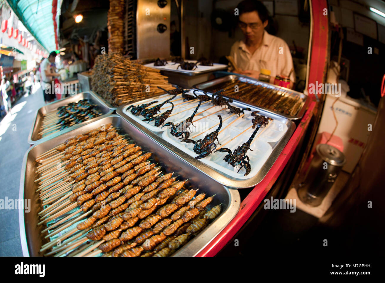Deep fried and on a stick, scorpions, silkworms, beatles, crickets ...