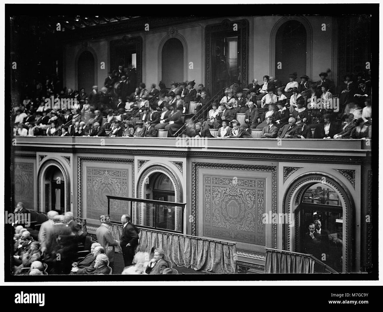 A historical image depicting President Woodrow Wilson before Congress ...