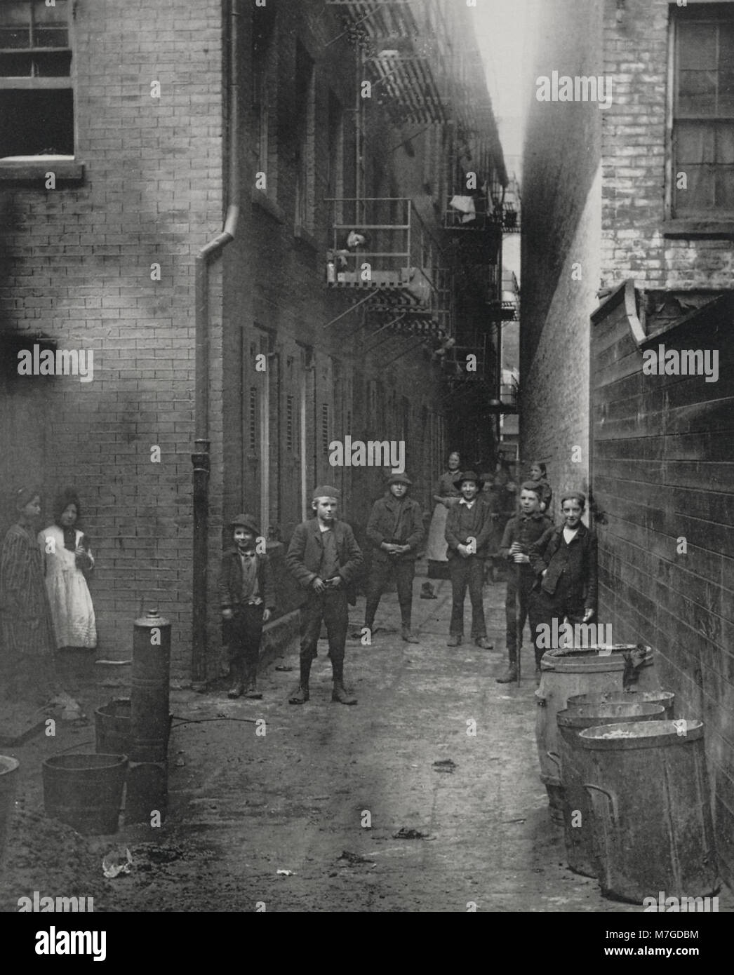 Jacob A. Riis, a prominent social reformer and photographer, captures ...