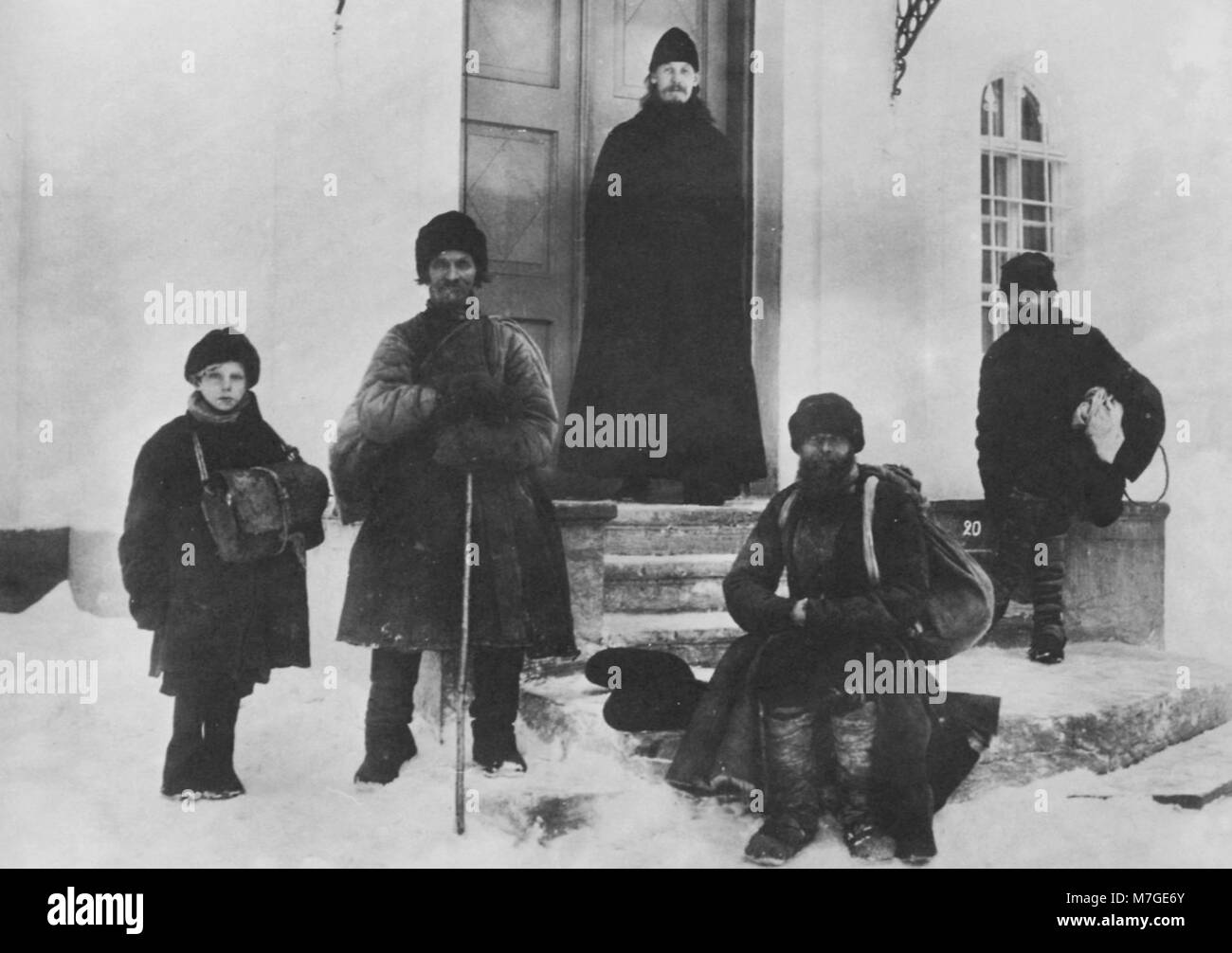 This photograph captures pilgrims and wanderers in Russia, showcasing ...