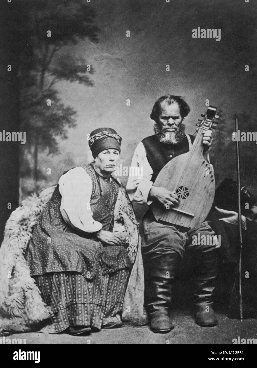 Playing traditional instruments Black and White Stock Photos & Images ...