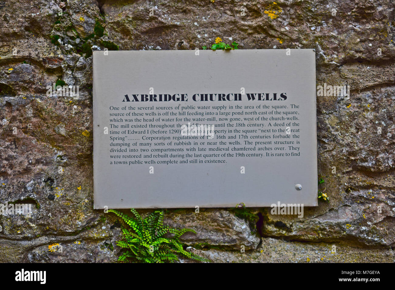 Axbridge church wells - The informative wall plaque above the public ...