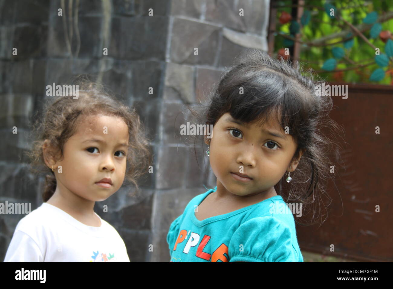 Cute little girls on the street Stock Photo - Alamy