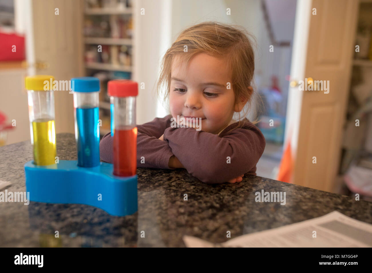 A little girl conducts a science experiment Stock Photo - Alamy