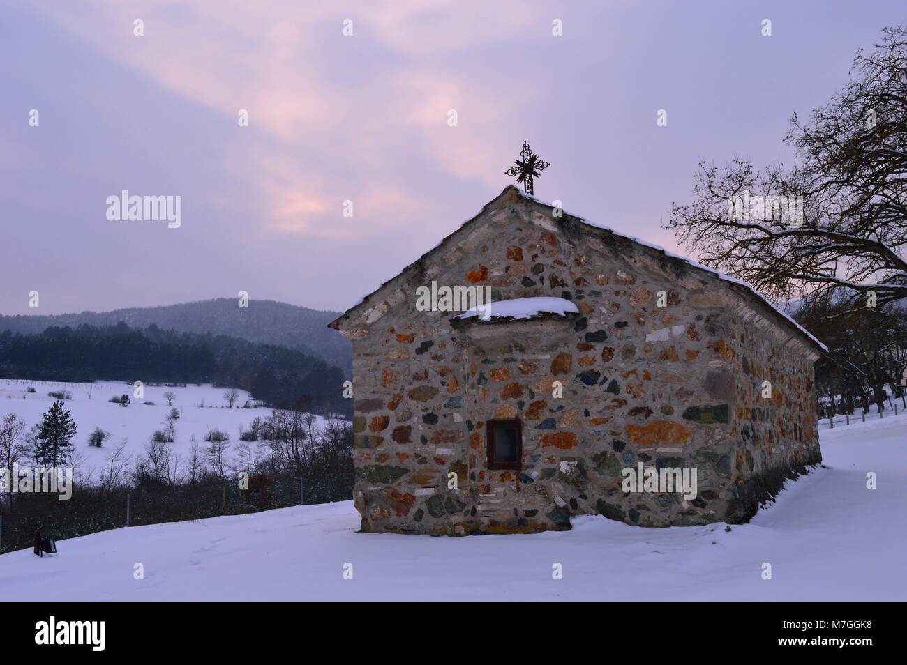 an old stone church in the snow Stock Photo - Alamy